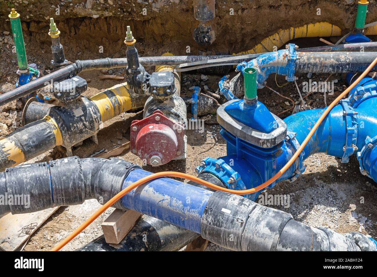 Water Supply Underground Pipes and Valves Installation Stock Photo - Alamy