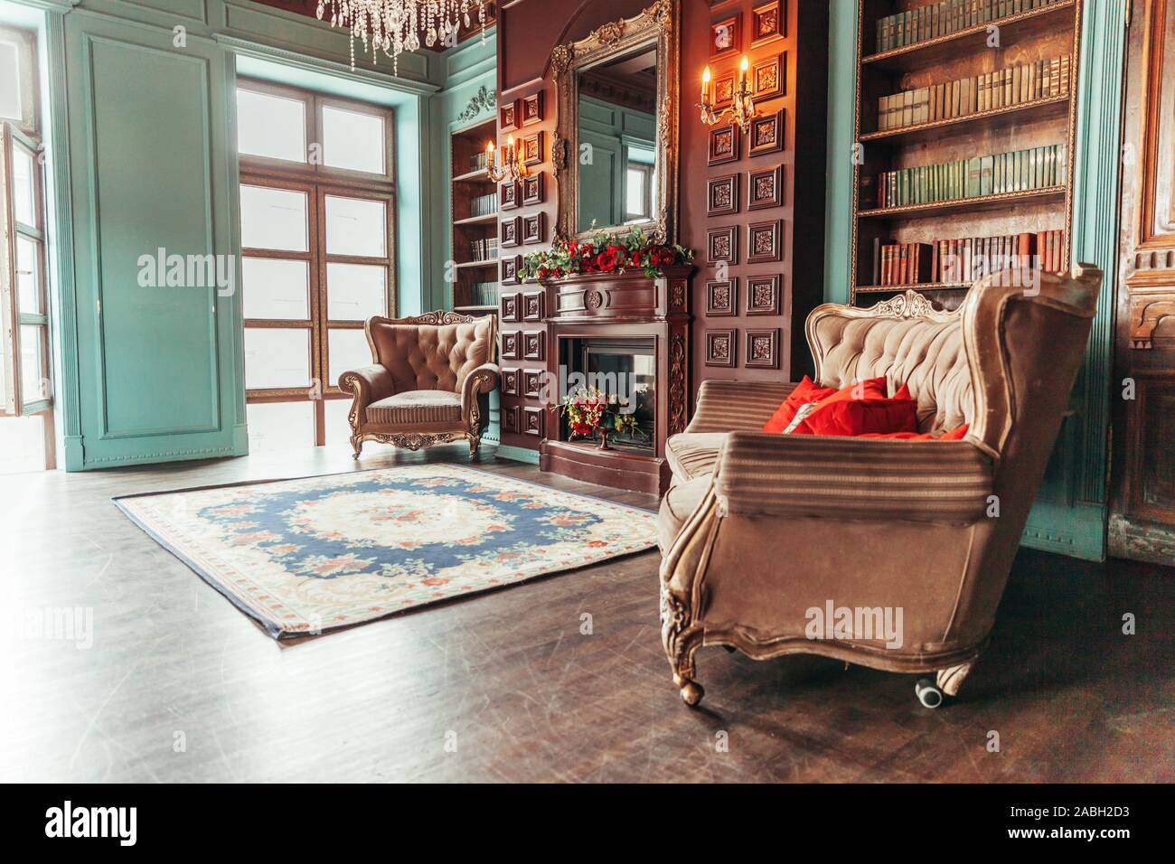 Luxury classic interior of home library. Sitting room with bookshelf ...