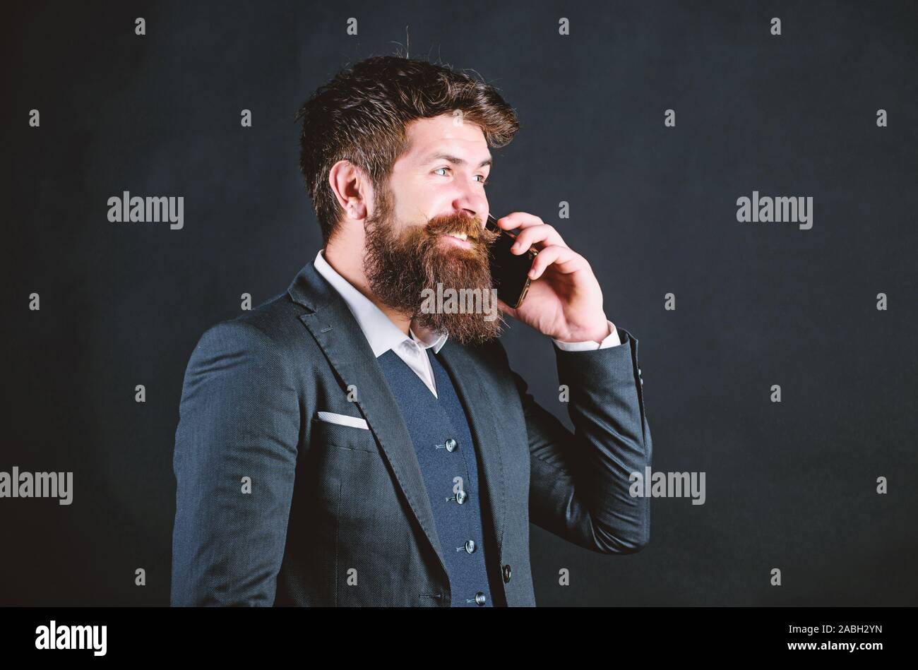 Mobile negotiations. Businessman well groomed mature man hold ...