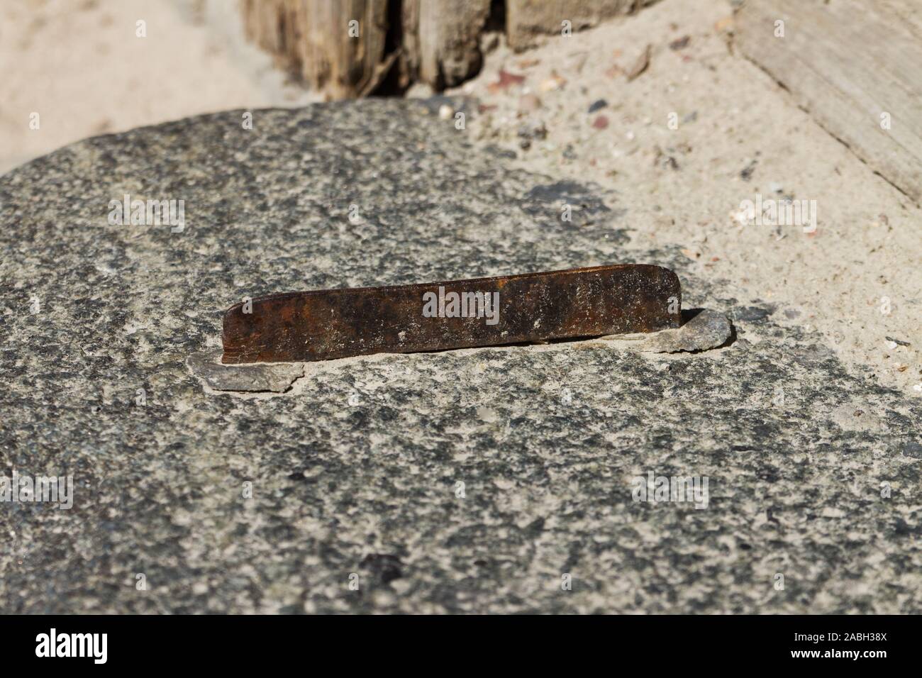 Old stone threshold with metal detail Stock Photo - Alamy