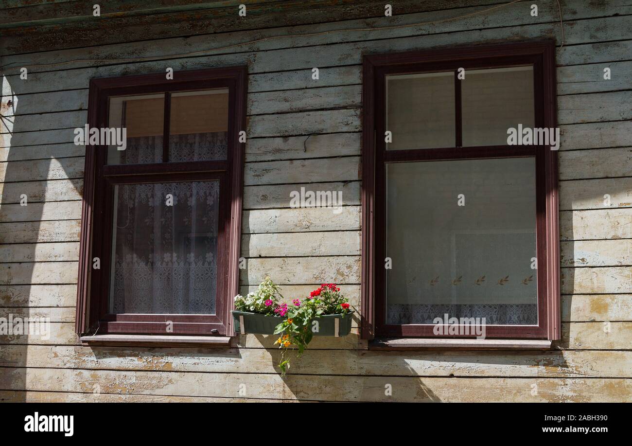 Windows on old dirty wall Stock Photo - Alamy