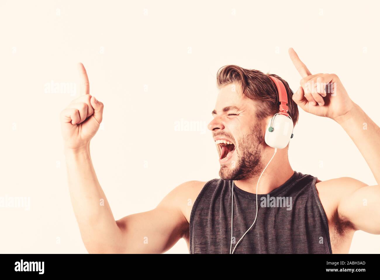 Start this party. Man handsome dj using modern headphones. Professional ...