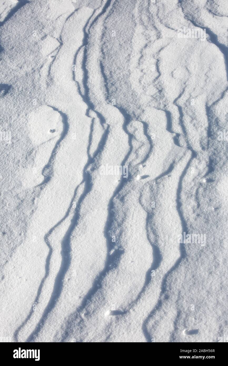 Snow drift patterns as background Stock Photo - Alamy