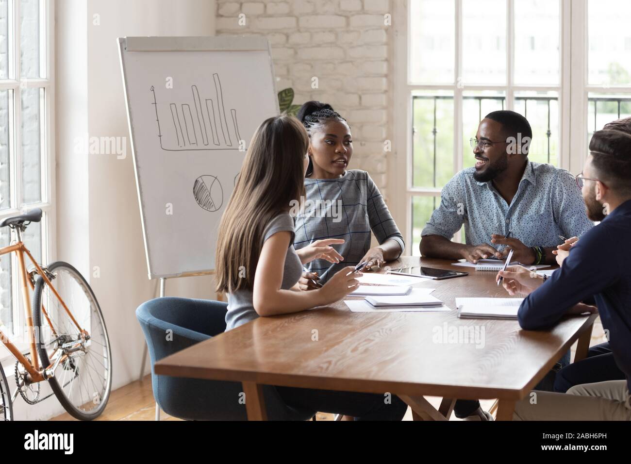 Happy diverse group of employees working at creative office Stock Photo ...