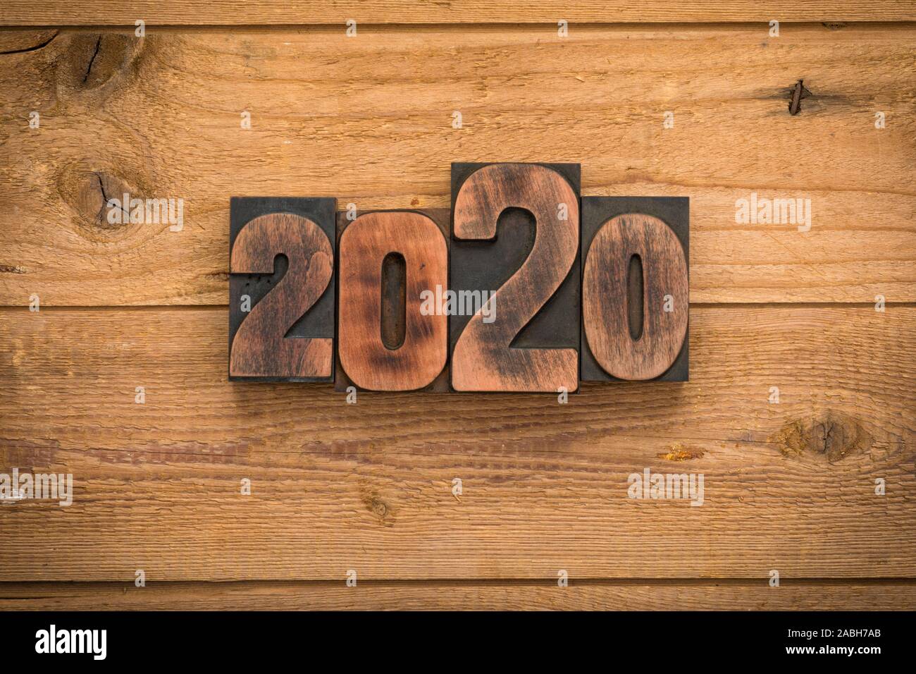 Year 2020, numbers written with vintage letterpress printing blocks on ...