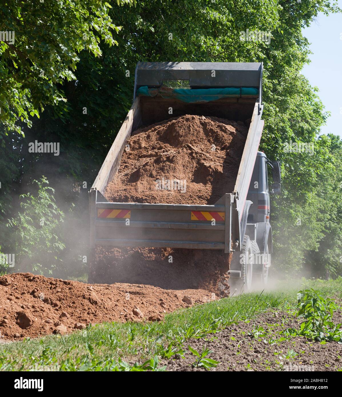 Soil road reconstruction with heavy machinery Stock Photo - Alamy