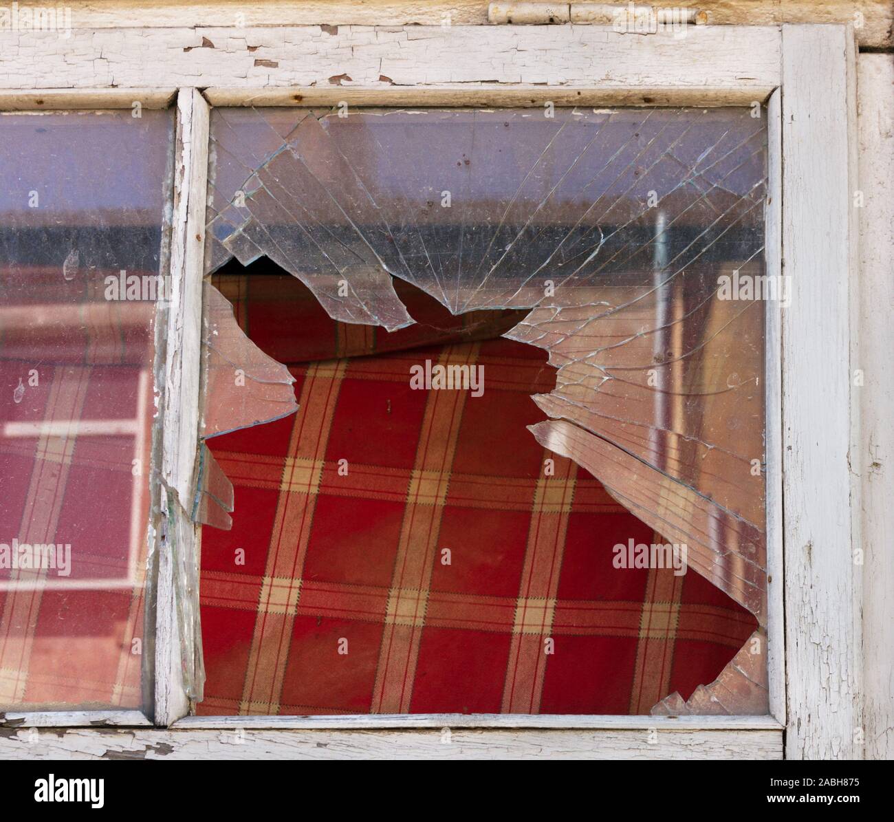 Glass window with old wooden frame on wall damaged house Stock Photo ...