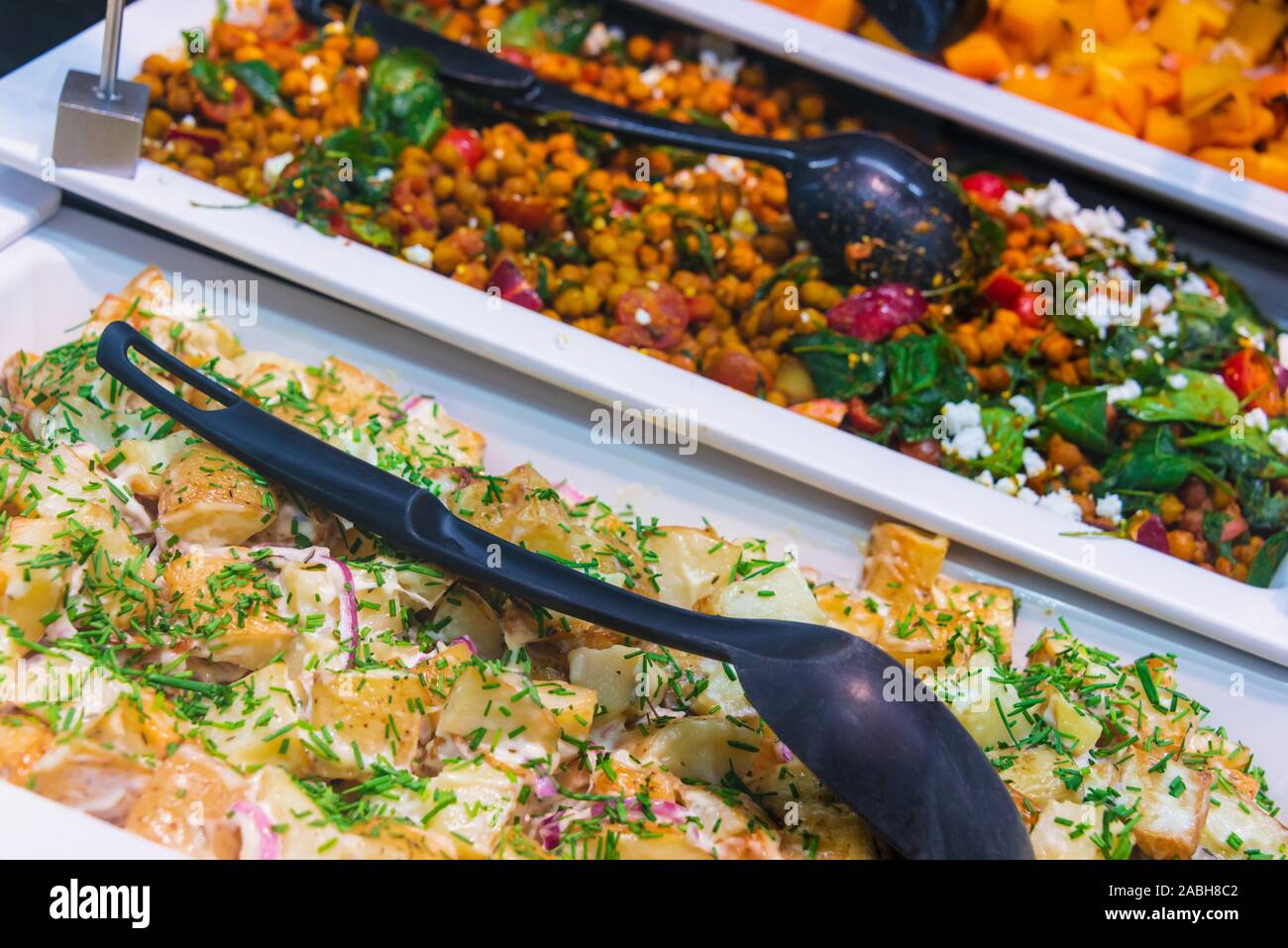 Assortment of fresh vegetable salads in restaurant buffet Stock Photo ...