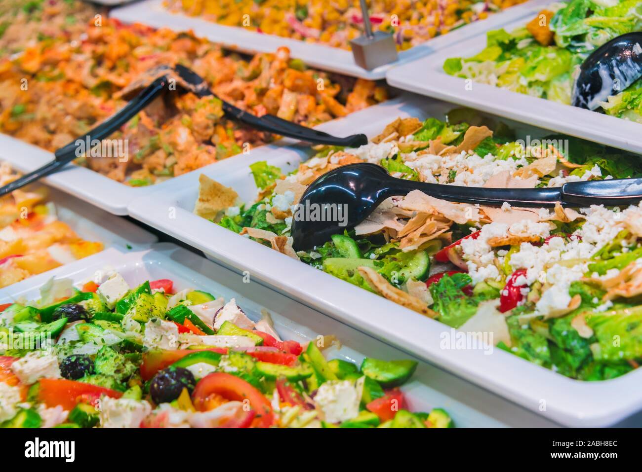 Assortment of fresh vegetable salads in restaurant buffet Stock Photo ...