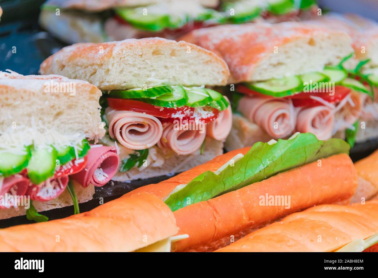 Sandwiches with vegetables and ham sold in fast food restaurant Stock ...