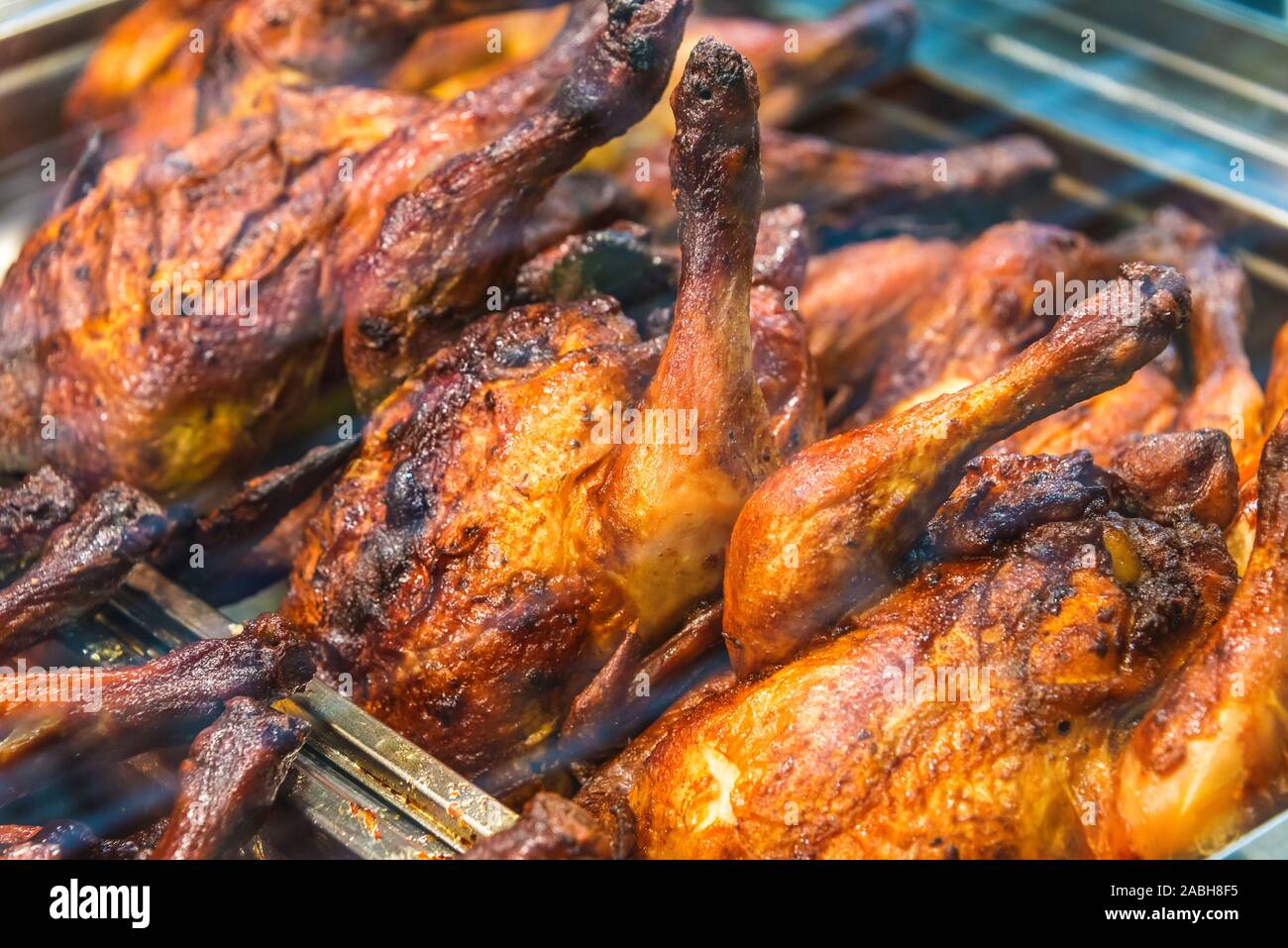 Roasted chicken on supermarket display. Ready to eat food Stock Photo ...