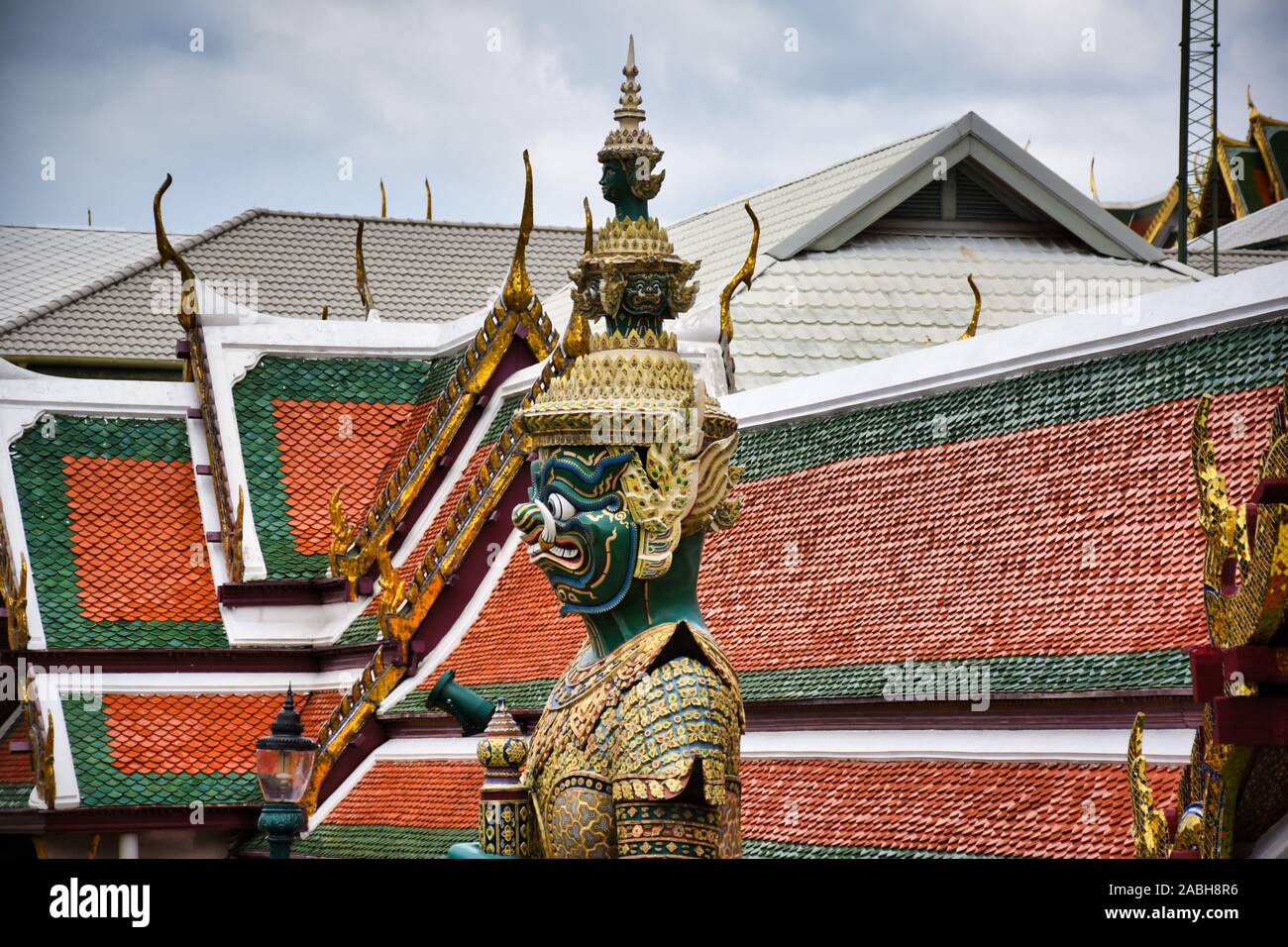 Giant Yak, Yaksha statue with large teeth, piercing eye with sword in ...