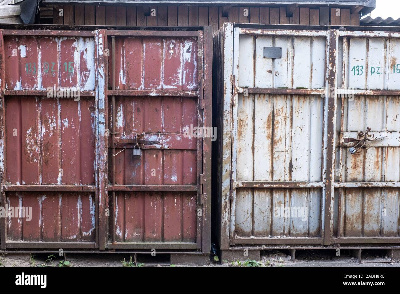 Old Cargo containers with scratch and rust. Steel padlock, metal door ...
