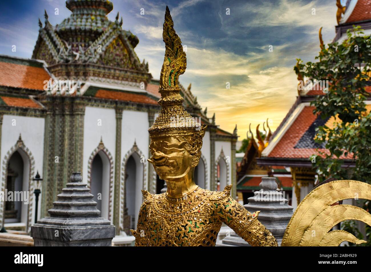Beautifully stunning gold statue of a Kinnara, a beloved mythical half ...