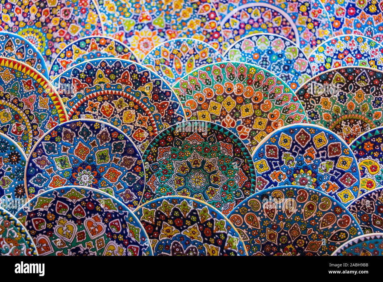 Colorful pottery dishes sold in Dubai souk, Unied Arab Emirates Stock ...