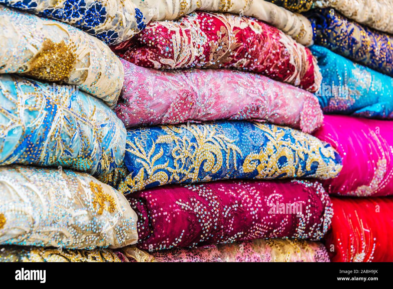 Traditional oriental cloth sold in a store in old town Dubai, United ...