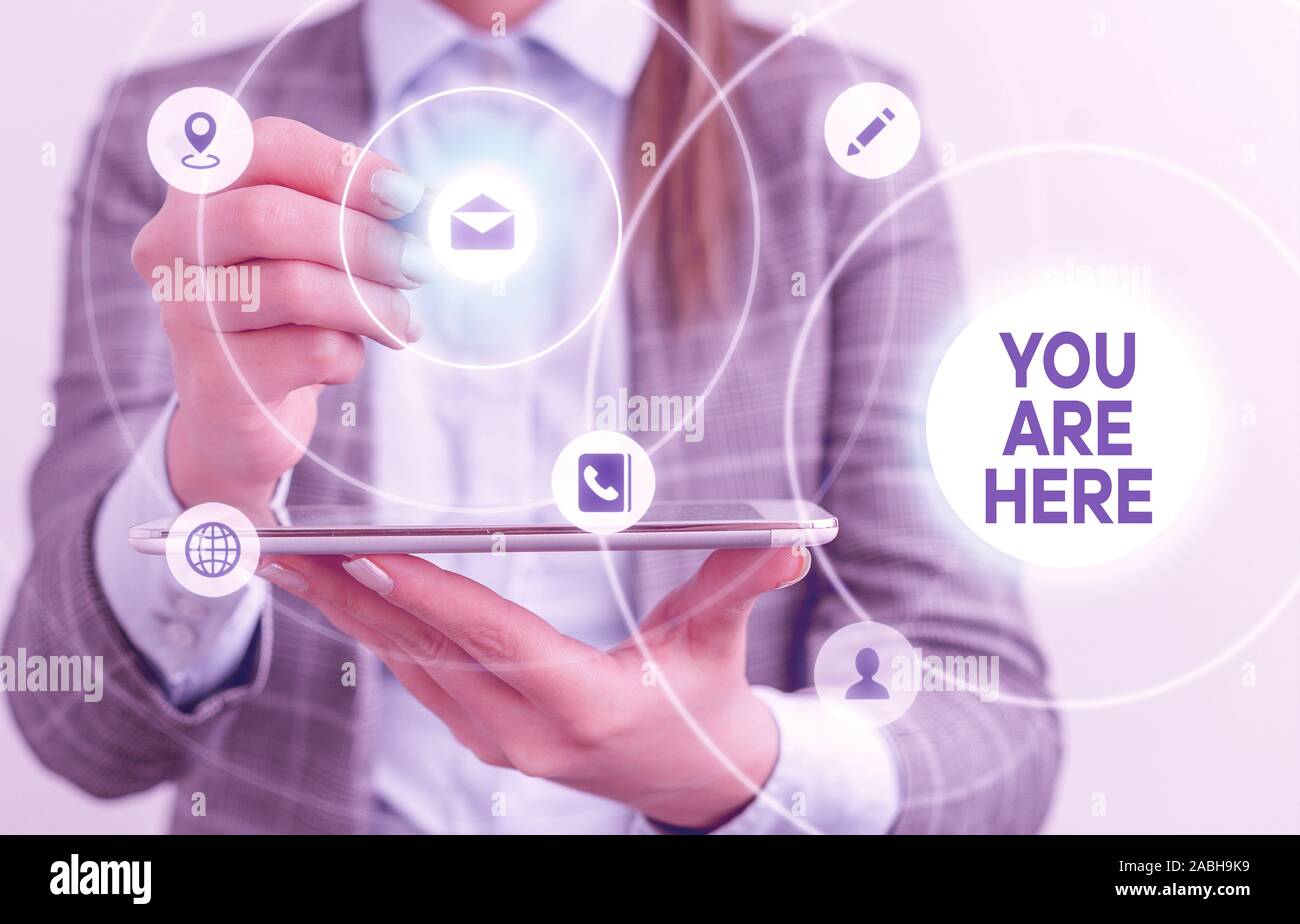 Writing note showing You Are Here. Business concept for This is your ...