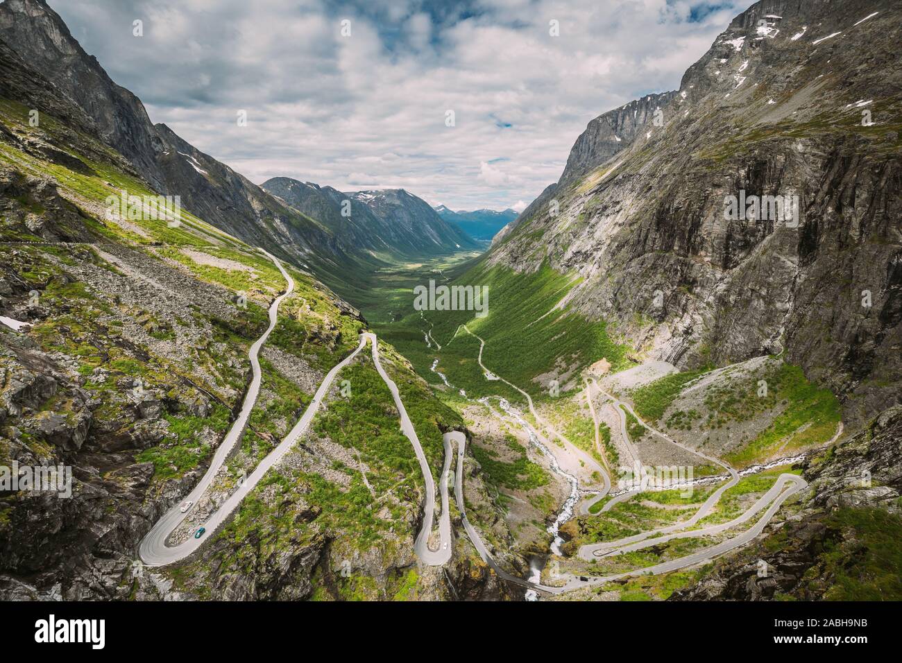 Trollstigen, Andalsnes, Norway. Cars Goes On Serpentine Mountain Road ...