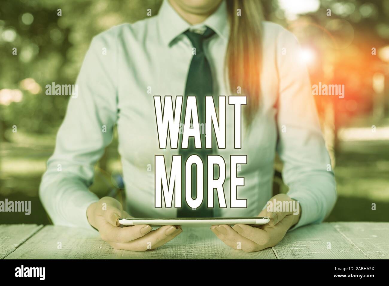 Writing note showing Want More. Business concept for Not having enough ...