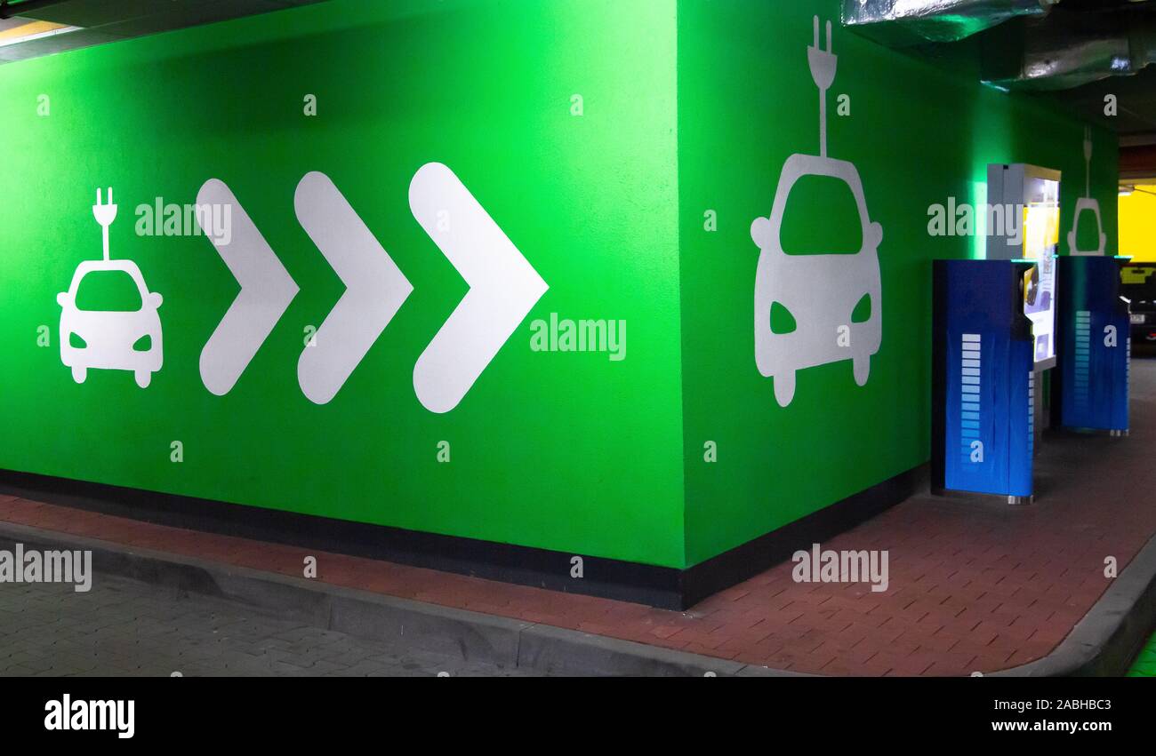 Symbol sign of electric cars charging station. Plug-in charger or ...