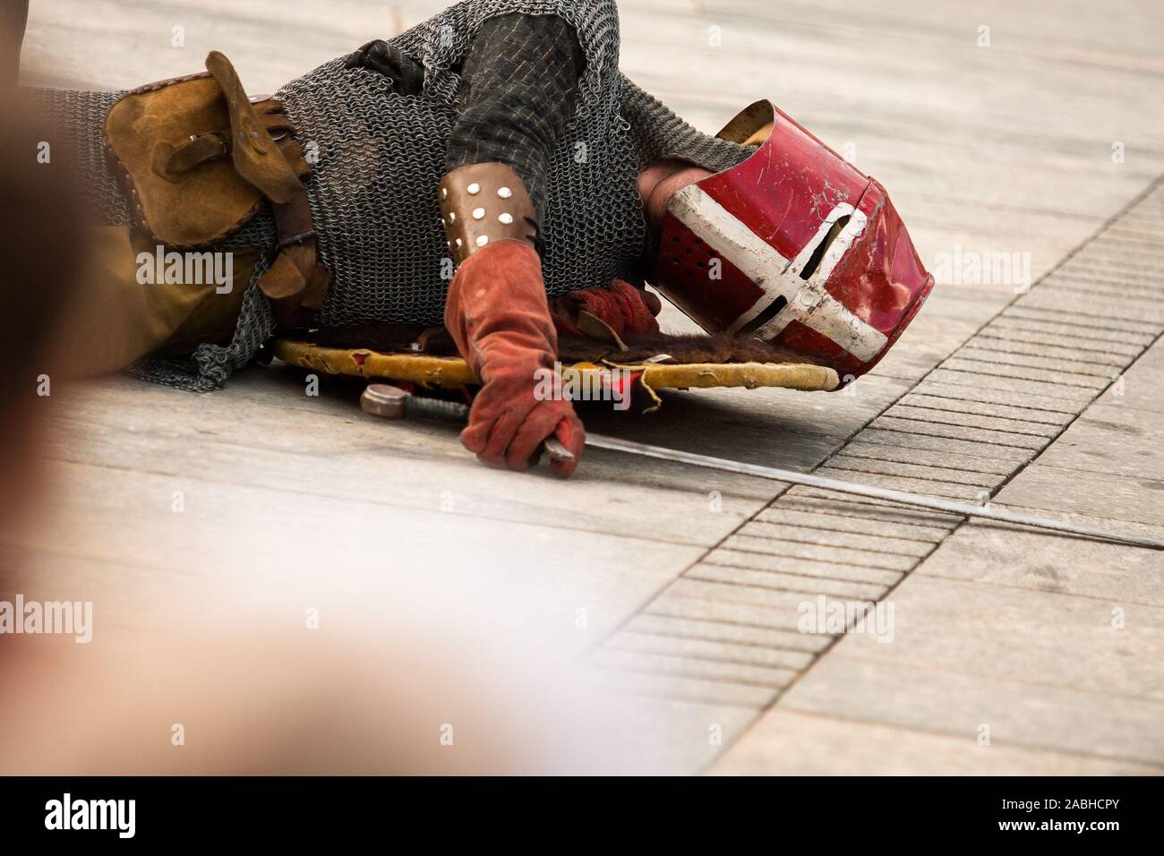 Ljubljana, Slovenia, September 9, 2007: A knight pretends to be killed ...