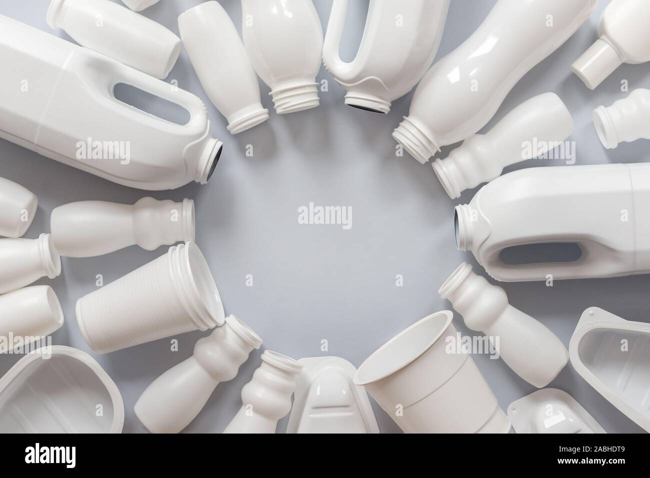 Used white plastic packaging for food on a gray background Stock Photo ...