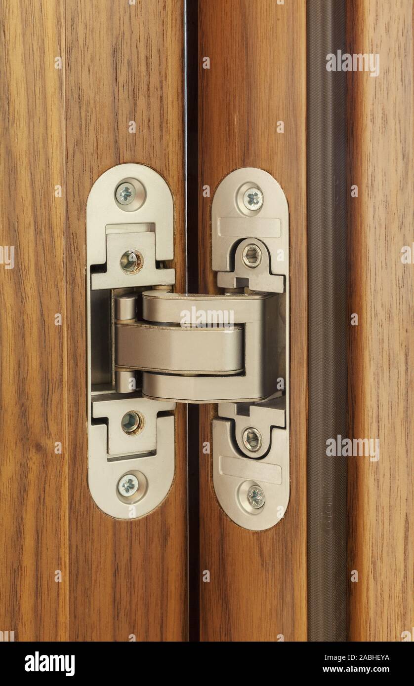 metal hinge for wooden doors, close up Stock Photo - Alamy