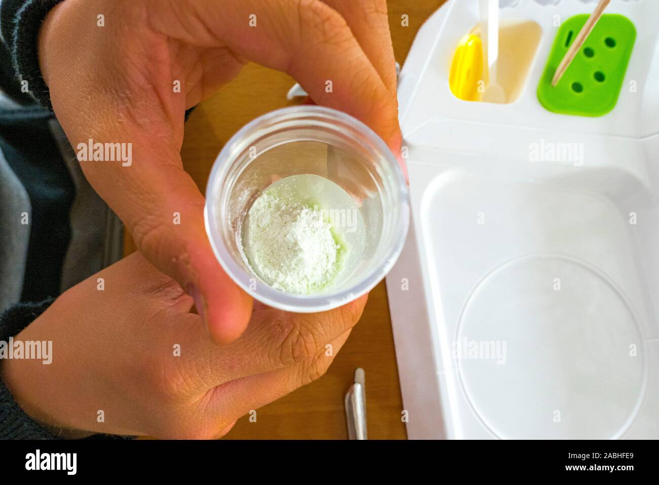 Laboratory tests with powder and test tube Stock Photo - Alamy