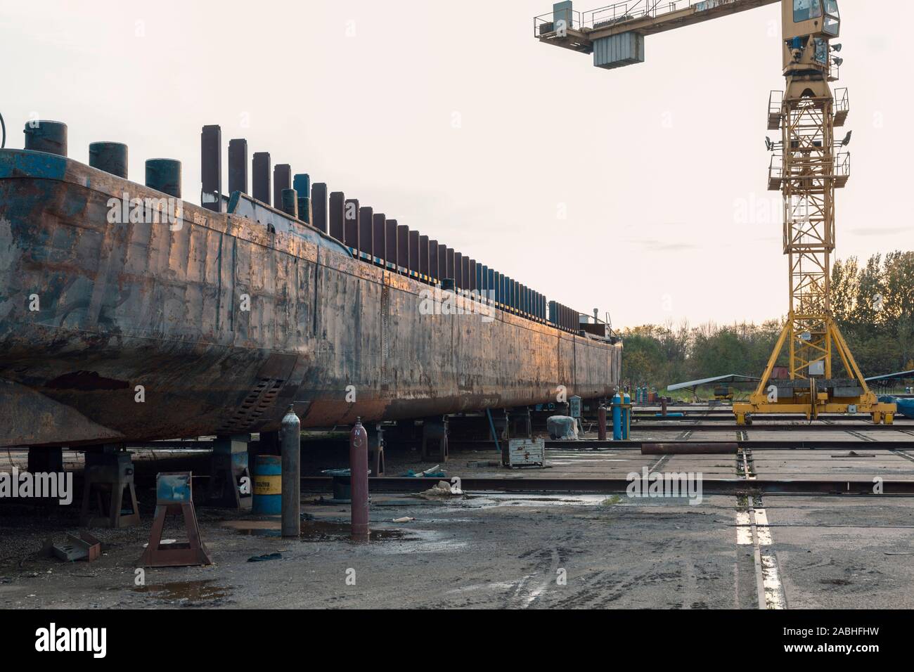 ship yard with rusty ship on dry dock, empty space Stock Photo - Alamy