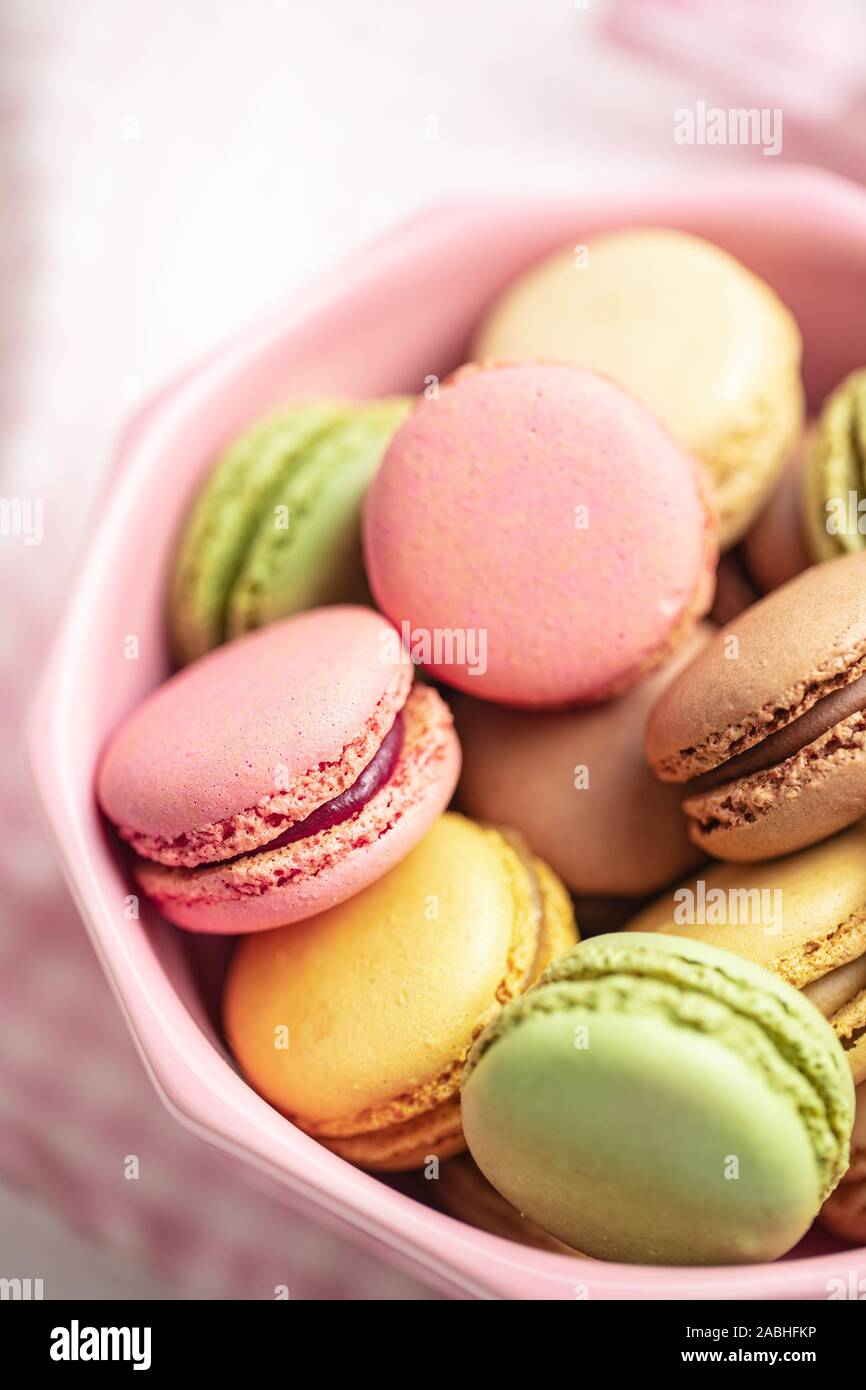Sweet colorful macarons in bowl Stock Photo - Alamy