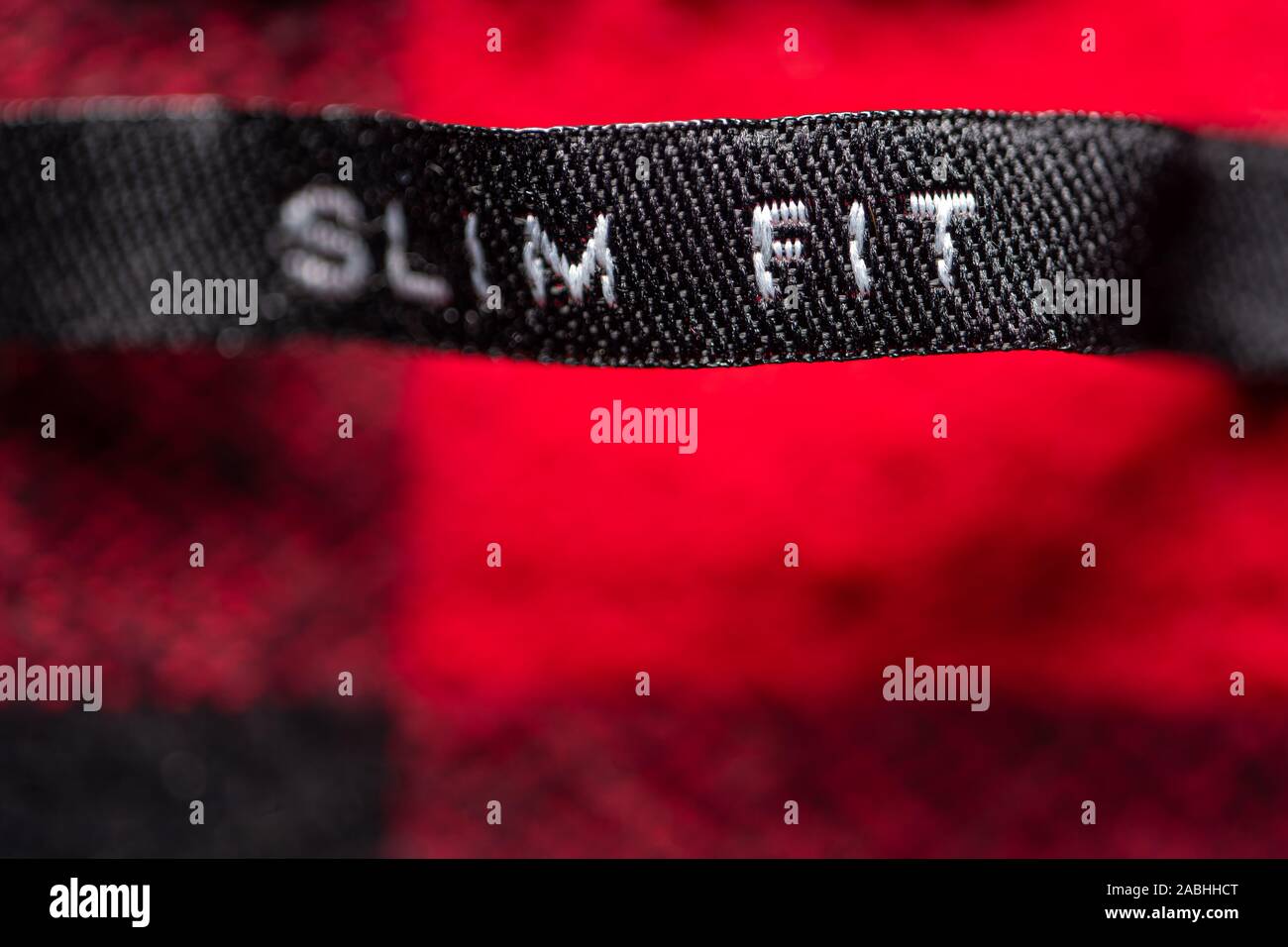 Label on a Red Shirt Indicating the Size of Clothes- Slim Fit. Red ...