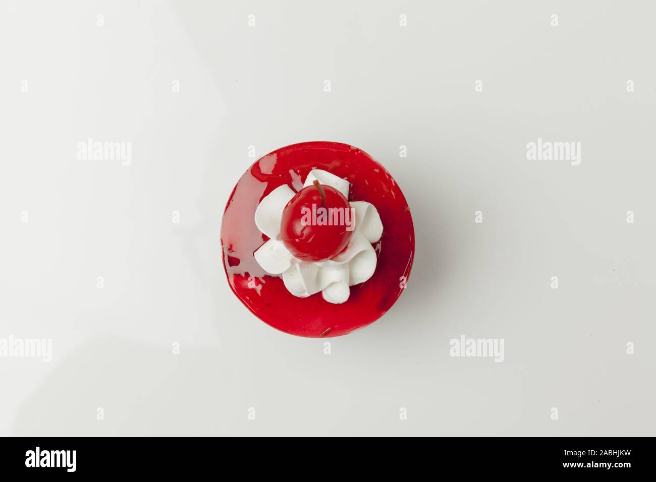 red cake on white background, top view, abstract background Stock Photo ...