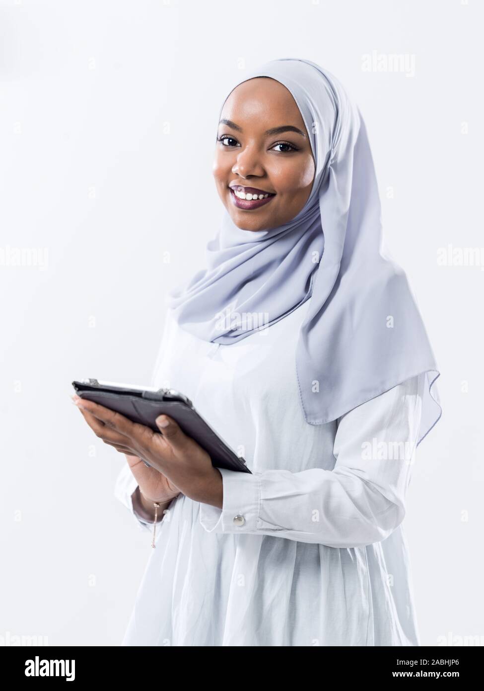young modern muslim african business woman using tablet computer ...