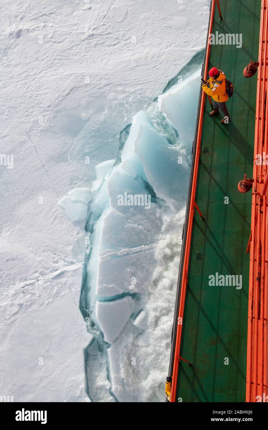 Russia, High Arctic. Crashing through thick sea ice at 89 degrees north ...