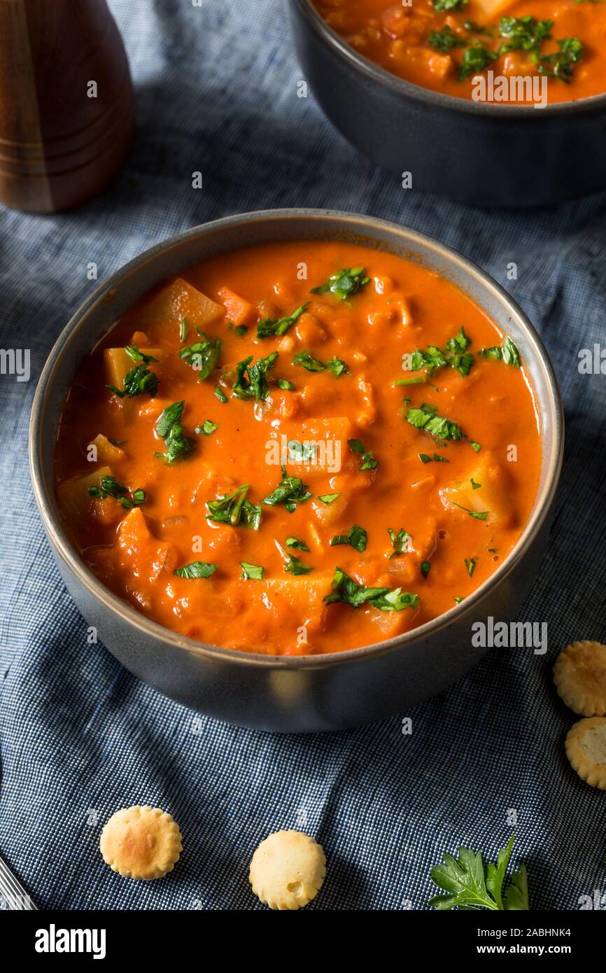 Homemade Red Tomato Manhattan Clam Chowder with Parsley Stock Photo - Alamy
