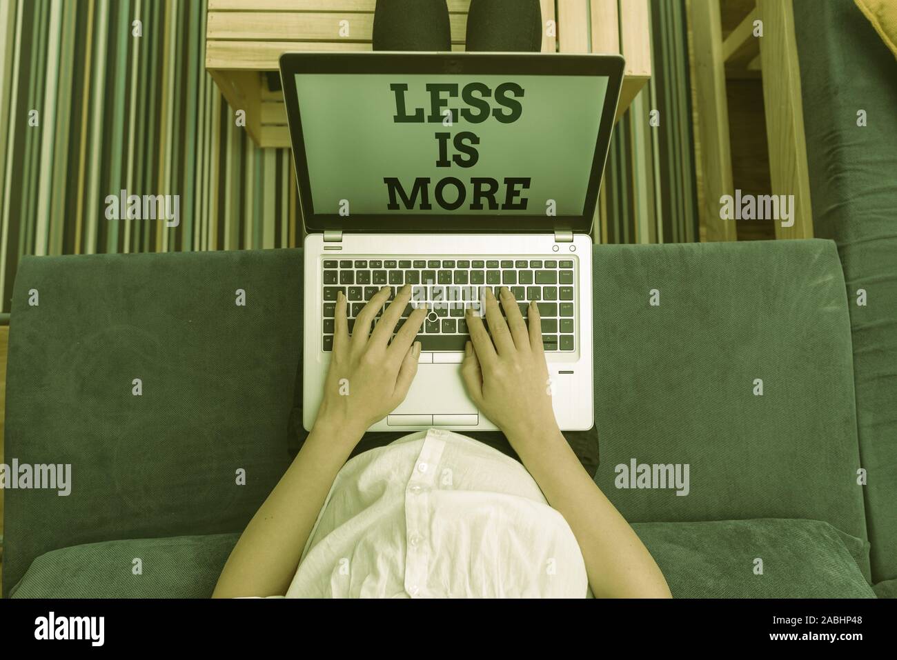 Writing note showing Less Is More. Business concept for Minimalist ...