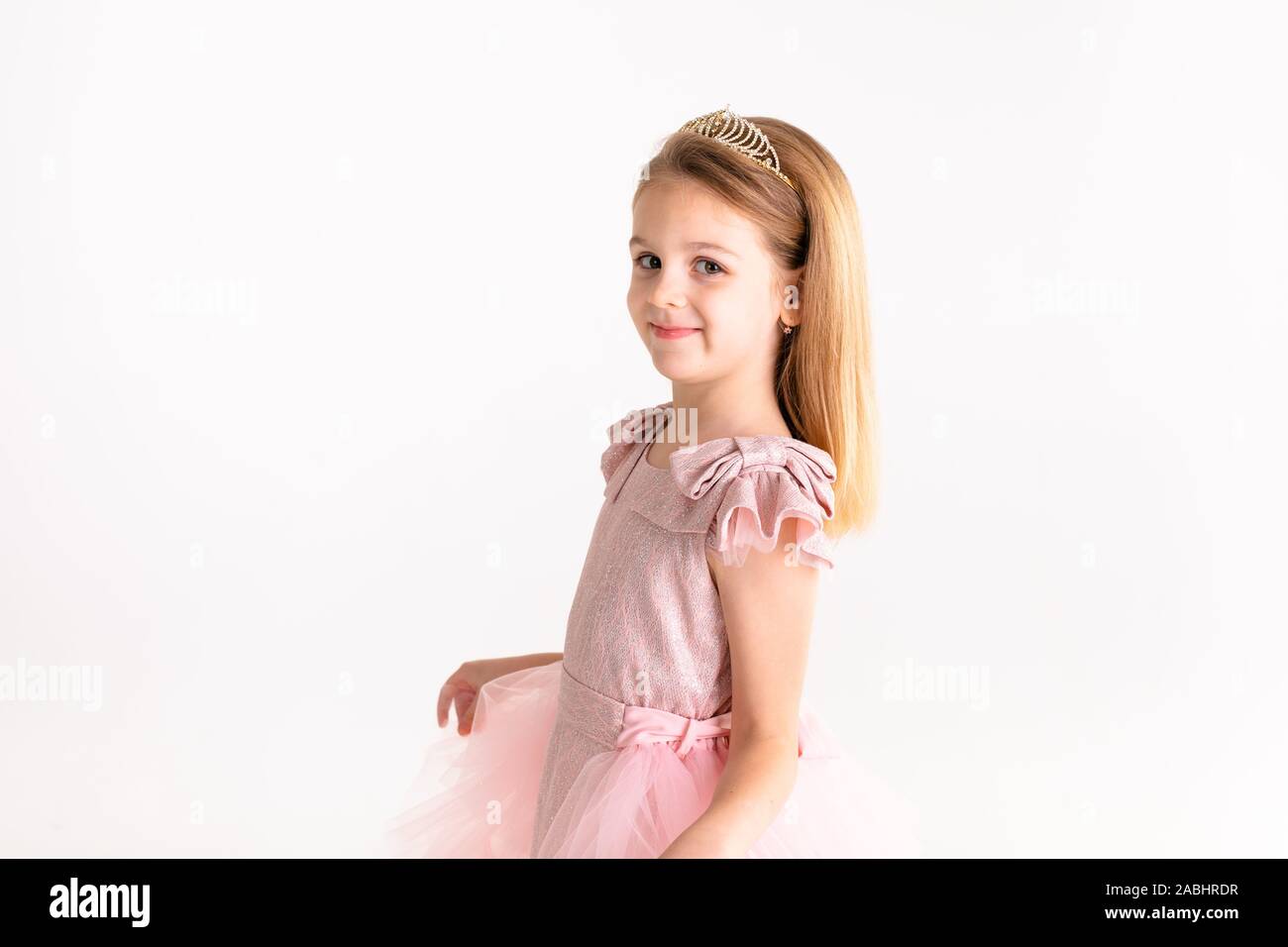 Beautiful little princess dancing in luxury dress Stock Photo - Alamy