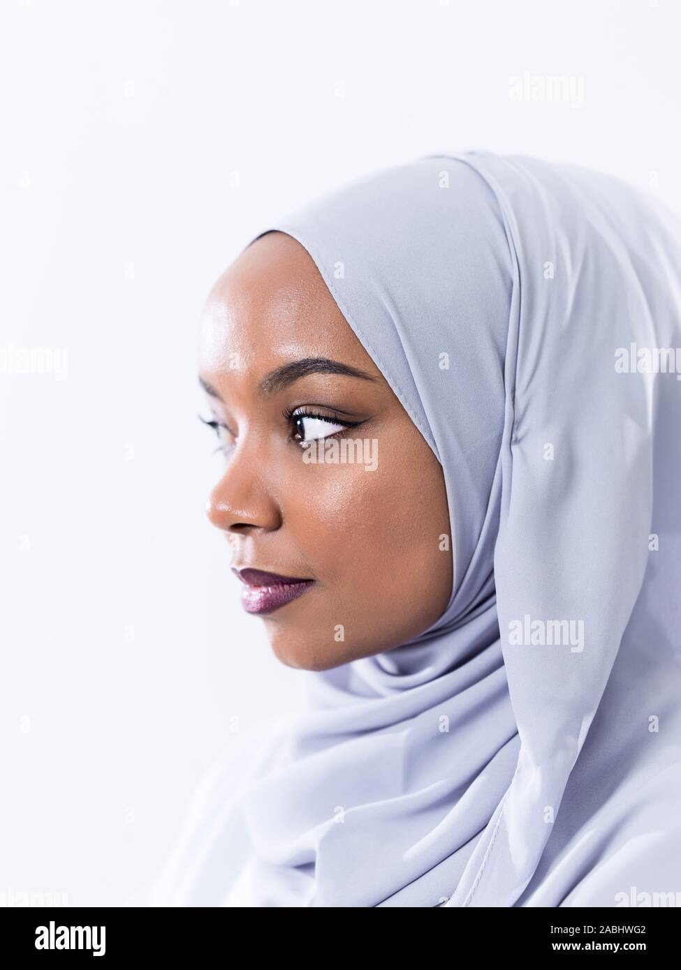 portrait of young modern muslim afro beauty wearing traditional islamic ...