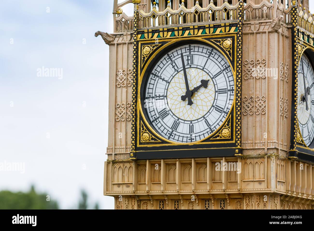 Old clock tower closeup, miniature scene Stock Photo - Alamy