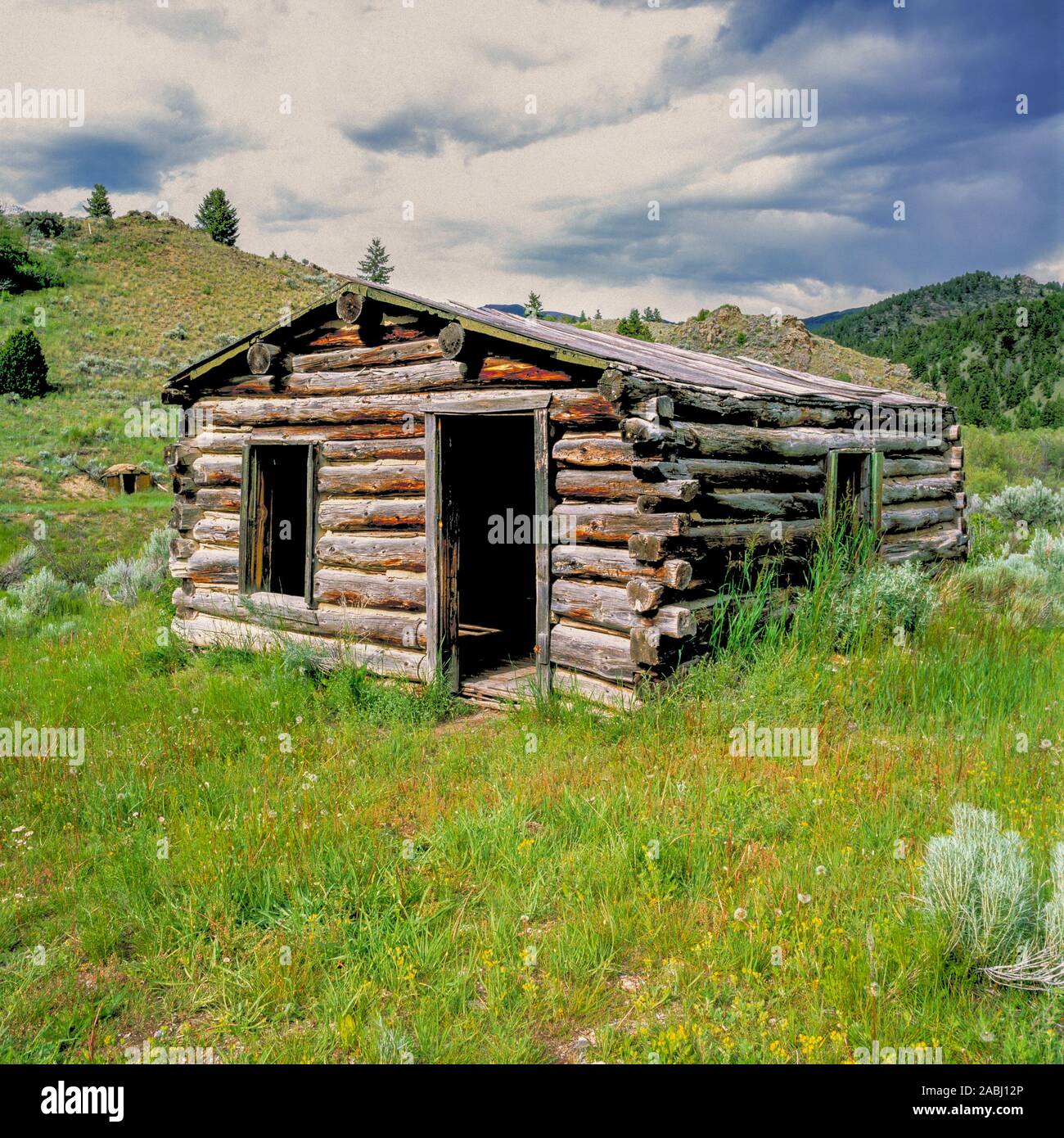 old log cabin in the foothills of the highland mountains near melrose ...
