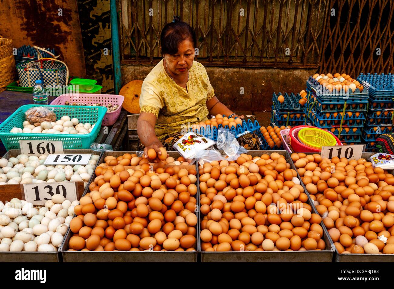 A Local Woman Sells Fresh Eggs At The 26th Street Market, Yangon ...