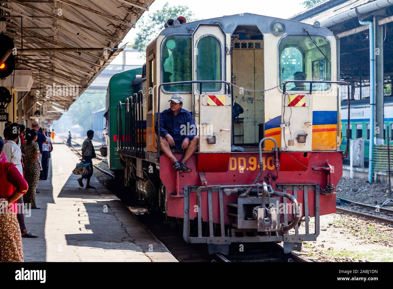 A Train Pulls Into Yangon Railway Station, Yangon, Myanmar Stock Photo ...