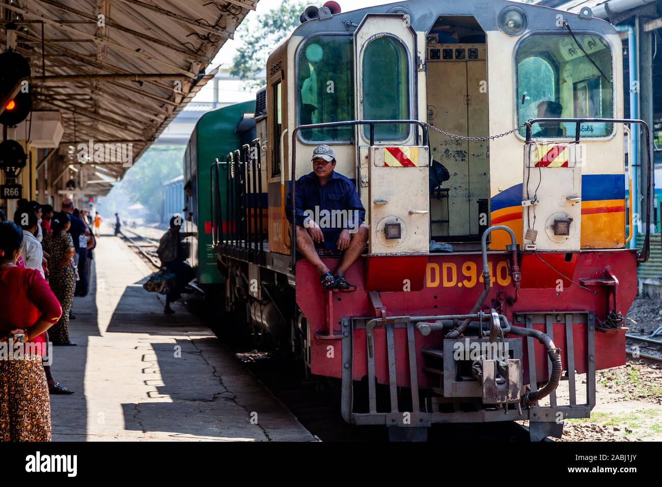 A Train Pulls Into Yangon Railway Station, Yangon, Myanmar Stock Photo ...