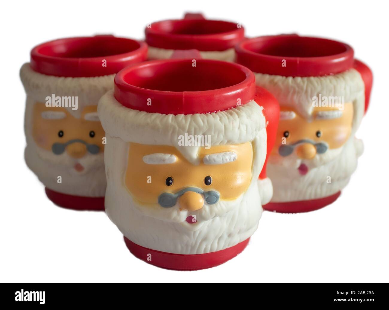 Four plastic cups of Santa's face Stock Photo - Alamy
