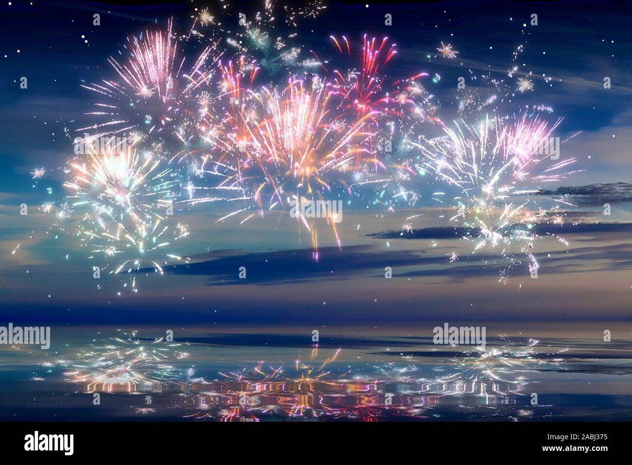 Beautiful and colorful fireworks in front of an evening sky with ...