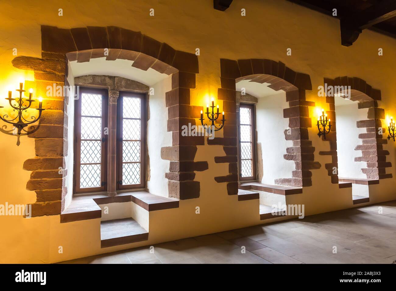 Windows with seating places in old castle, Europe Stock Photo - Alamy