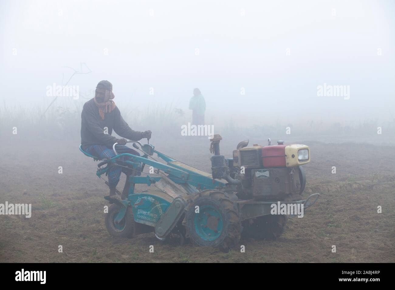 2 people riding on a tractor hi-res stock photography and images - Alamy