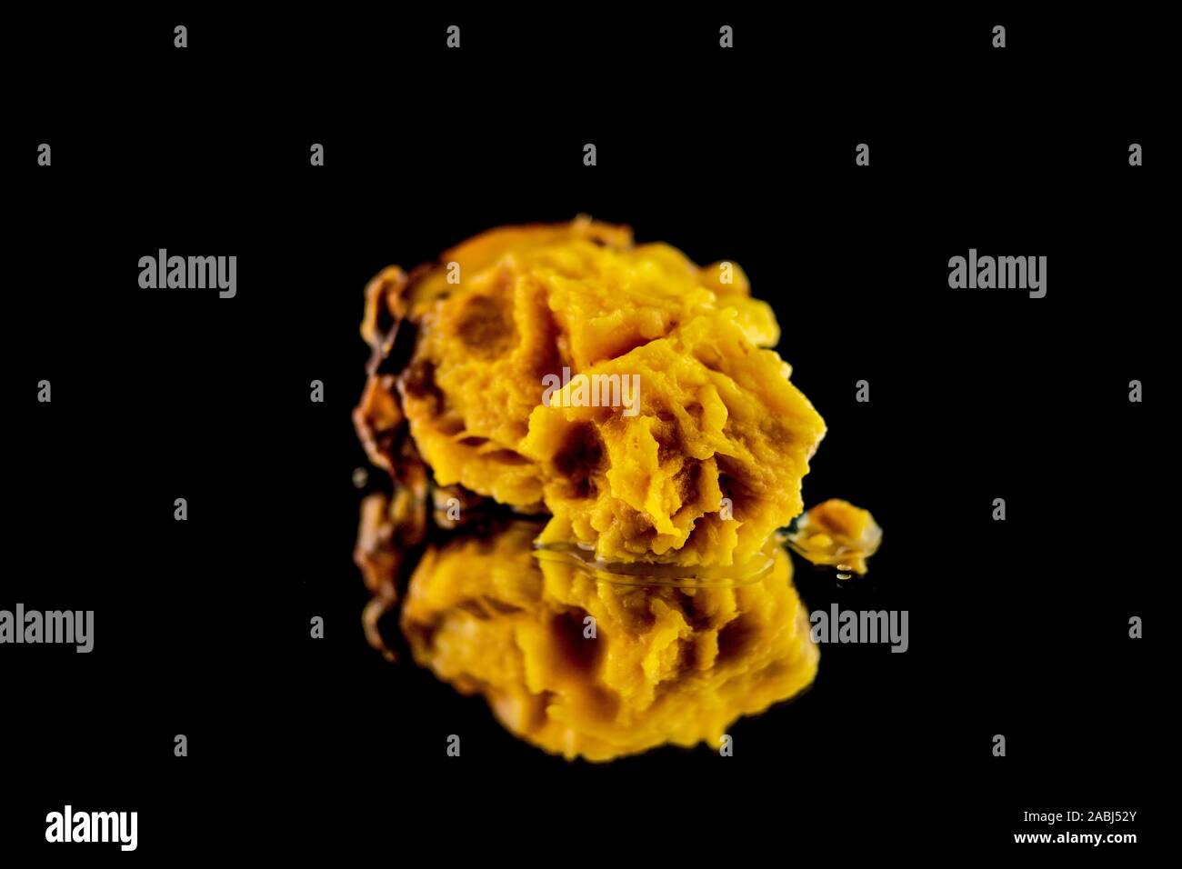 Rotten Fruit with slight decay on a reflective surface Stock Photo - Alamy