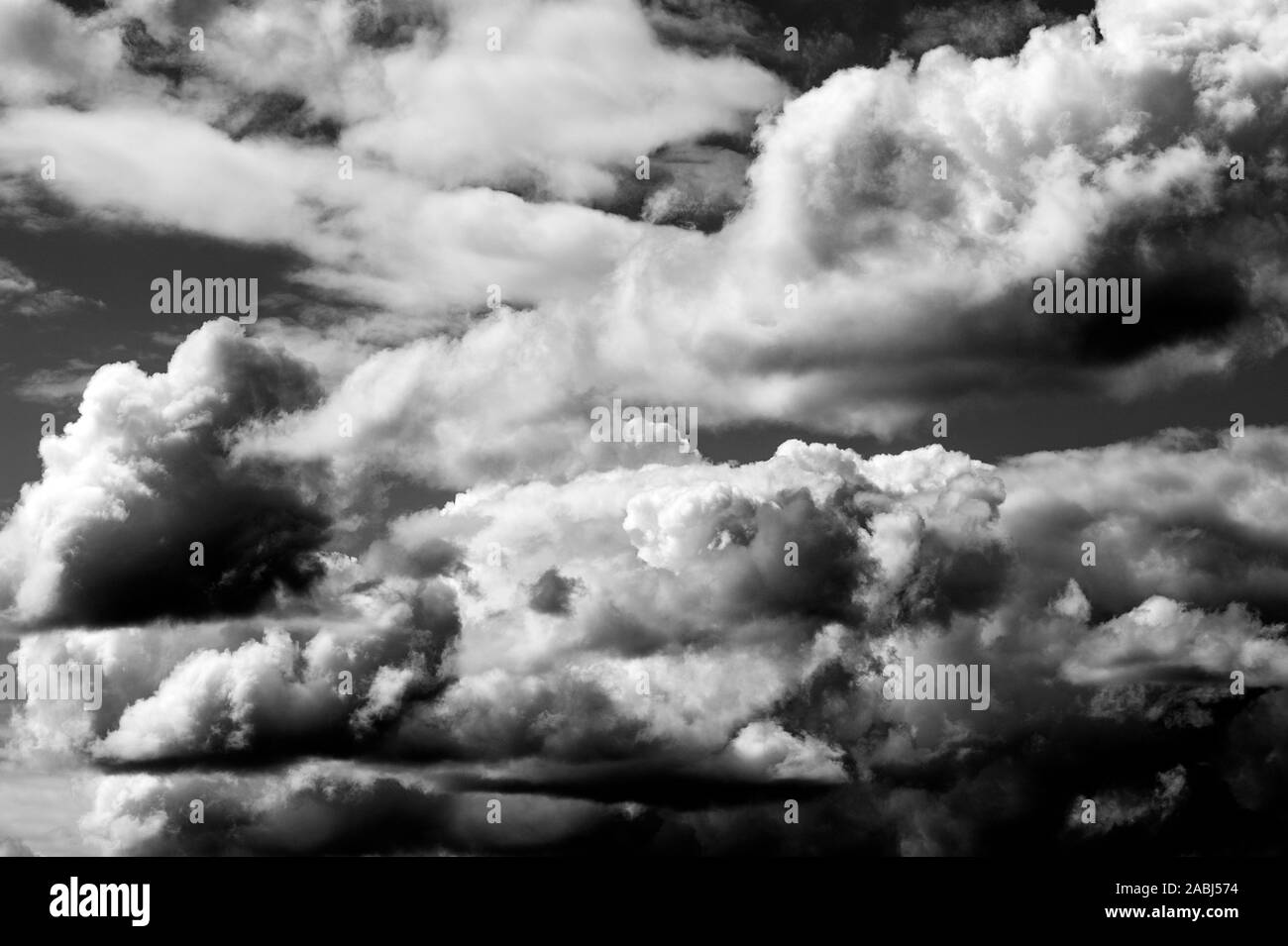 Cumulus clouds with vertical growth in dramatic sky Stock Photo - Alamy