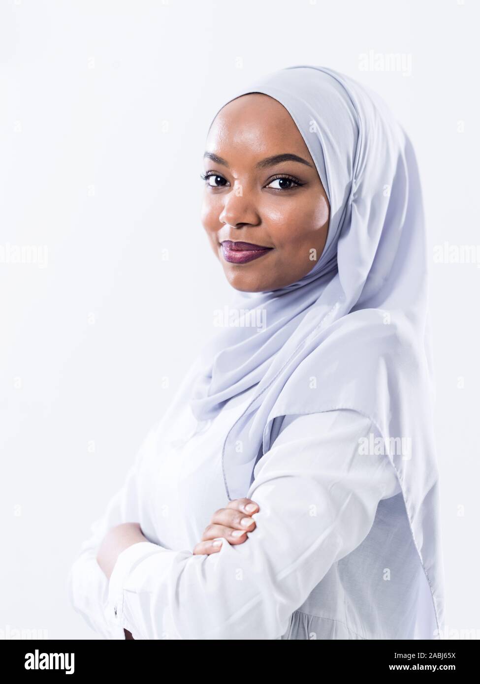 portrait of young modern muslim afro beauty wearing traditional islamic ...